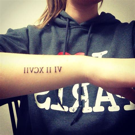 Roman Numeral Tattoo I Love This Placement Roman Numeral Tattoos Tattoo Placement Tattoos