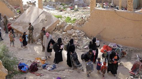 SDF Says Waves Of ISIS Fighters Families Continue To Surrender In Baghouz