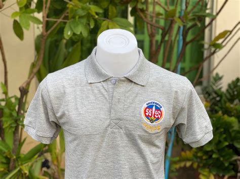 អាវ ទឹកប្រផេះ រំលេចដោយ Logo កងរាជវុធហត្ថ