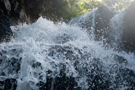 Texture Of A Flowing Waterfall On The Wall Background Vertical Stock