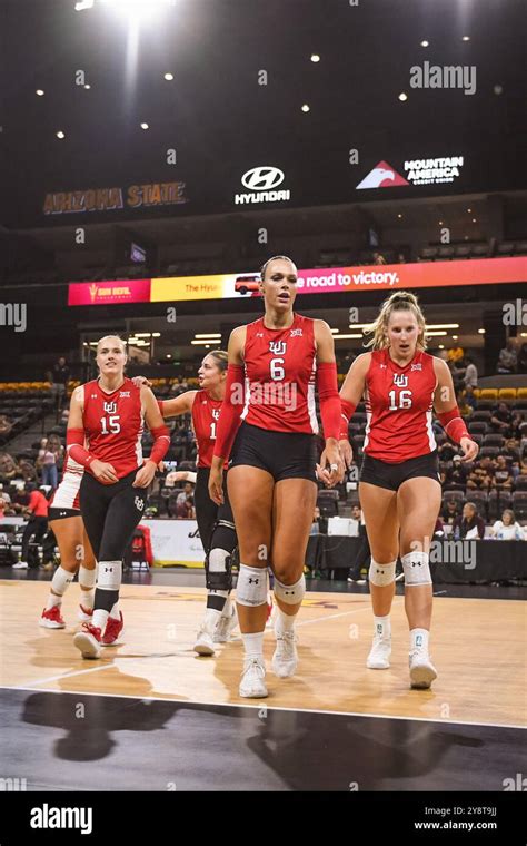 Utah Outside Hitter Ashley West 6 And The Utes Walk Around The Net In The First Set Of An Ncaa