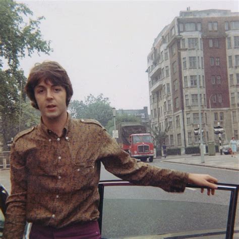 Portrait Of Paul Mccartney From The Beatles Posed Wearing A Paisley