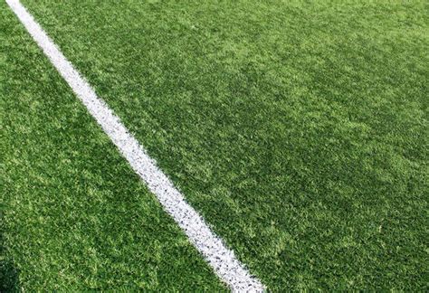 Premium Photo Marking On Grass Field