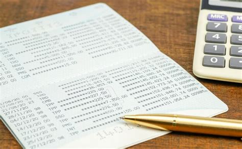 Premium Photo Book Bank Saving With Banknotes Calculator Penbank Account Passbook Bookbank