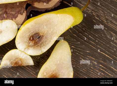 The Pulp Of Pear Inside Of Which Has Begun To Rot Rotted Inside Of A Ripe Pear From Long Term