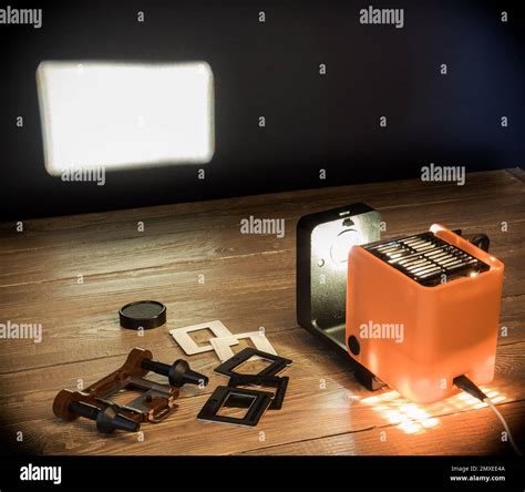 A S Slide Projector Sits On A Table Next To A Slide Frame Stock Photo Alamy
