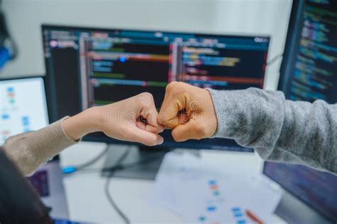 Asian And Indian Developer Team Clapping Hand For Project Success With Software Computer At