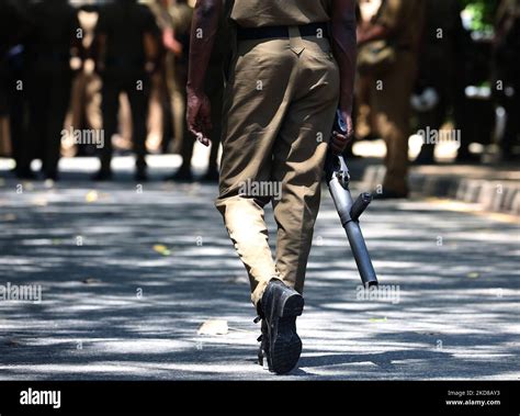 Sri Lankan Riot Police Officers Gather Near Roadblocks During An Anti
