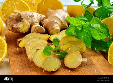 Lemons Ginger And Mint Leaves Lemon Halves Slices Of Ginger And Mint
