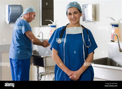 Surgeons in scrubs Stock Photo - Alamy