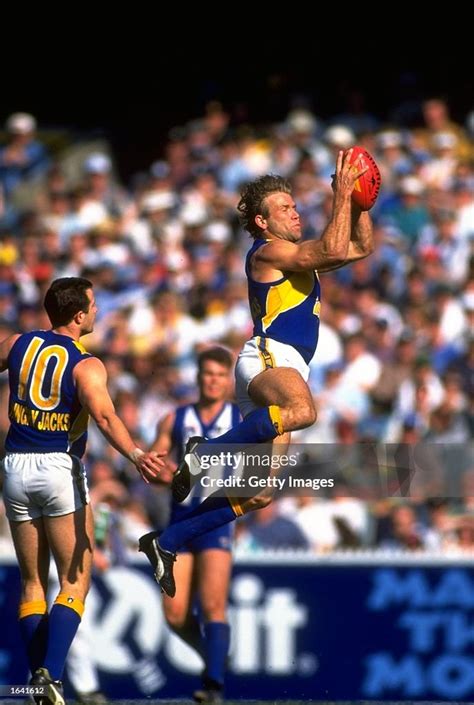 Chris Mainwaring Of The West Coast Eagles Marks The Ball During An