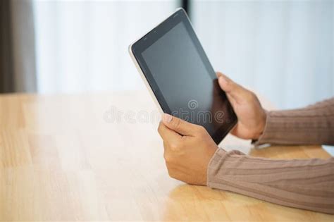 Man Hands Holding Smart Tablet With Laptop Keyboard Young Man Freelance Hands Typing On Laptop