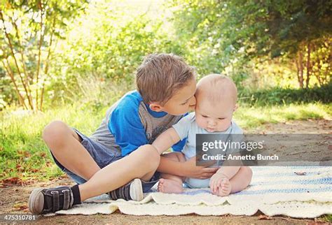 Brothers Kissing Stock Fotos Und Bilder Getty Images