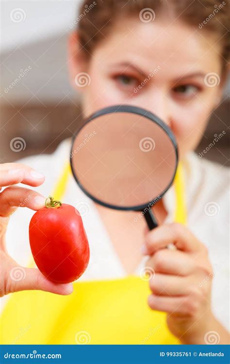 Woman Inspecting Tomato With Magnifying Glass Stock Image Image Of Consumerism Food