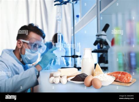Scientist Inspecting Products In Laboratory Food Quality Control Stock