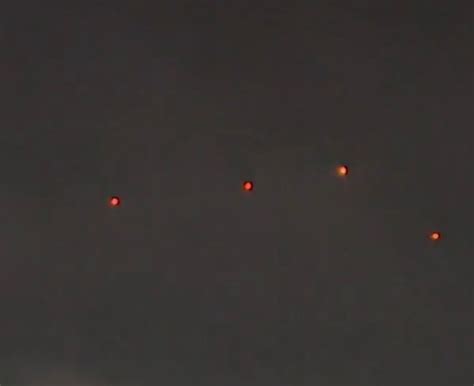 Mysterious Orbs Spotted Hovering Over Major City As Stunned Onlooker