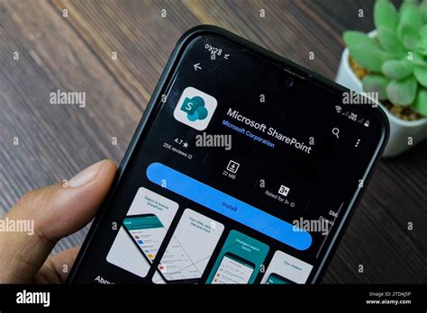 Microsoft Sharepoint Application On Smartphone Screen Microsoft Sharepoint Is A Freeware Web