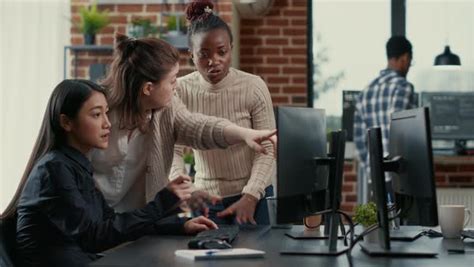 Mixed Team Of Programmers Brainstorming Ideas For New Code Library In