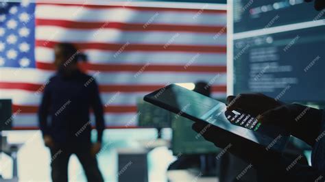 Free Photo Cybersecurity Expert In A Governmental It Environment With The American Flag