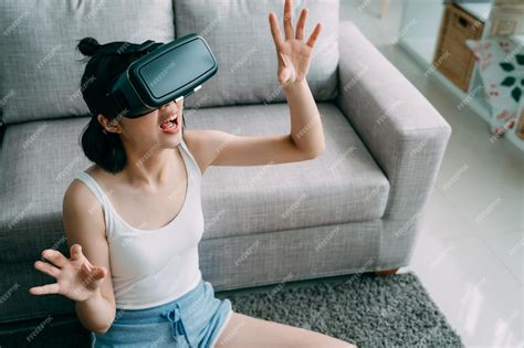 Premium Photo Young Asian Japanese Girl Wear Vr Headset Helmet At