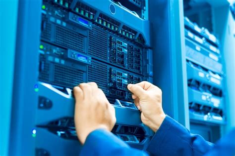 Premium Photo It Engineer Repairing A Server In A Datacenter