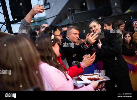 Greta Gerwig Poses For Photographers Upon Arrival At The Premiere Of