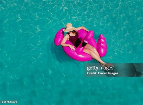 Pink Pool Float Photos And Premium High Res Pictures Getty Images