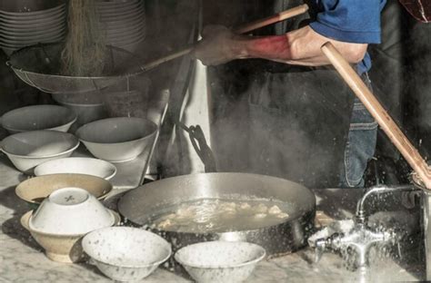 Premium Photo Man Working In Kitchen