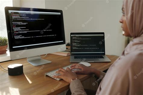 Premium Photo Focus On Hands Of Young Muslim Female Programmer Decoding Data