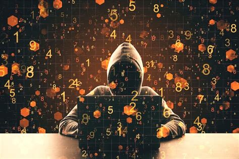 Premium Photo Hacker At Desktop Using Laptop With Abstract Digital