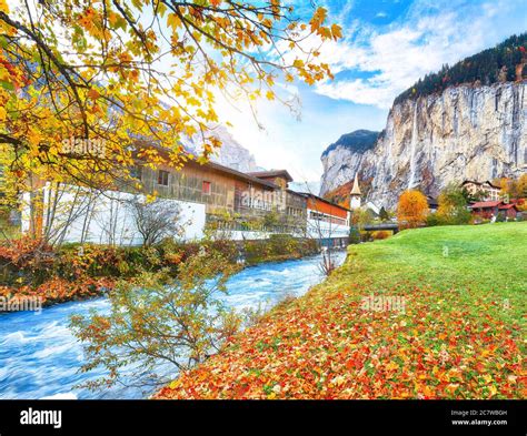 Stunning Autumn View Of Lauterbrunnen Village With Alpine Alps
