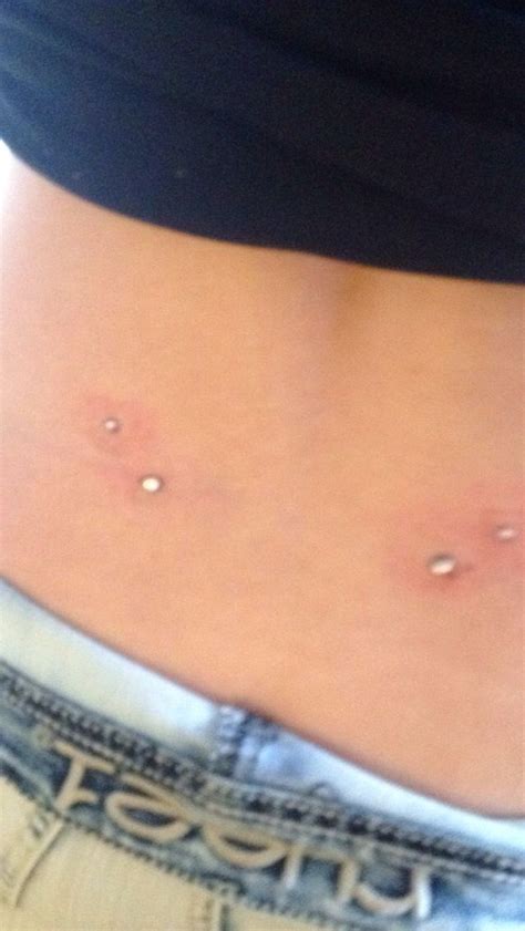 Back Dermals Back Dimple Piercings Unique Body Piercings Pretty Ear