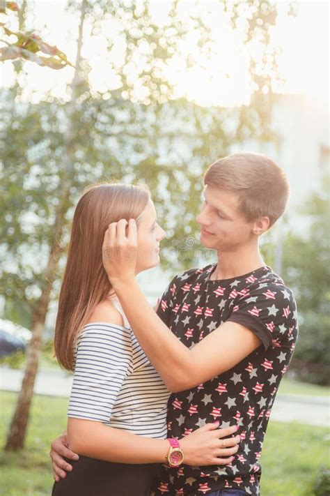 Boyfriend Hugging His Girlfriend And Stroking Her Hair Stock Photo Image Of Holding Husband