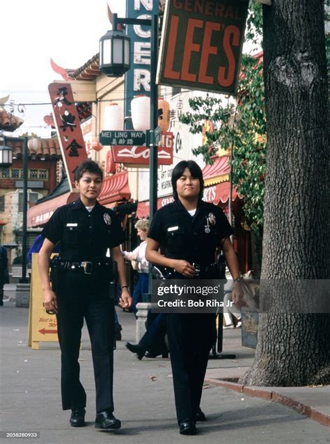 Los Angeles Police Department Officers On Foot Patrol In Chinatown