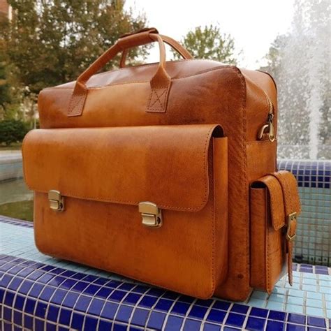 خرید و قیمت کیف اسپورت با جای لپ تاب چرم طبیعی بوفالو کاملا دست دوز