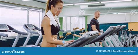 Woman Setting Control Panel Of Treadmill For Training Stock Photo Image Of Digital Active