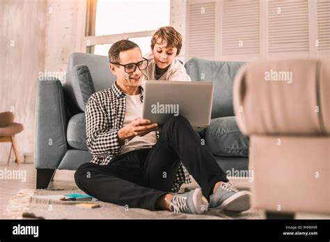Curious Kid Asking His Dad Questions About Complicated Facts Stock