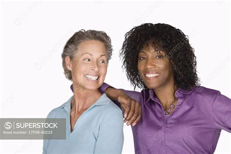 Studio Portrait Of Two Mature Women Superstock