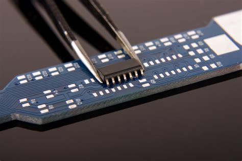 Tiny Integrated Circuit On Empty Pcb Board Electronics