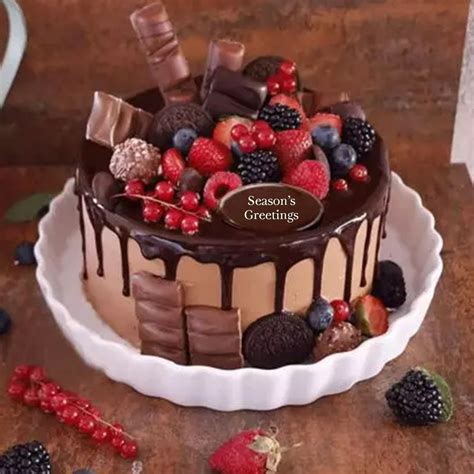 Express Delivery Candy Topped Chocolate Cake Order Now From Fnp Saudi Arabia