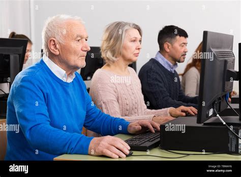 Computer Lessons For Adults Group Of People Of Different Ages Learning To Use Computers In