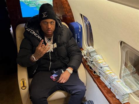 EBK Jaaybo flaunts cash bundles on private jet after release from prison