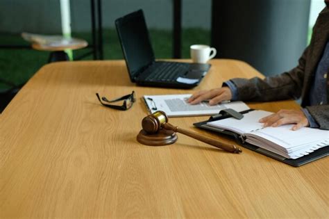 Premium Photo Man Using Laptop On Table