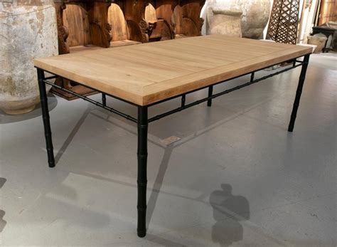table with iron base imitating bamboo with wooden top in its original