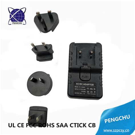 Interchangeable EU AU US UK Plug V A MA W AC DC USB Power Adapter AC DC Adaptor And