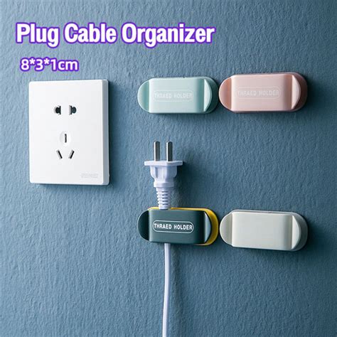 C N Plug Holder Wall Mounted Power Cord Storage Adhesive Free Punch Bracket Socket Hooks