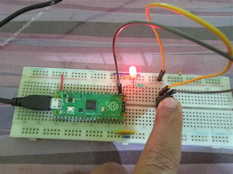 interface push button with raspberry pi pico and control led