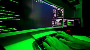Hacker S Hands On Keyboard Typing Malicious Code On Large Screen A Black Hat Programmer Hacking