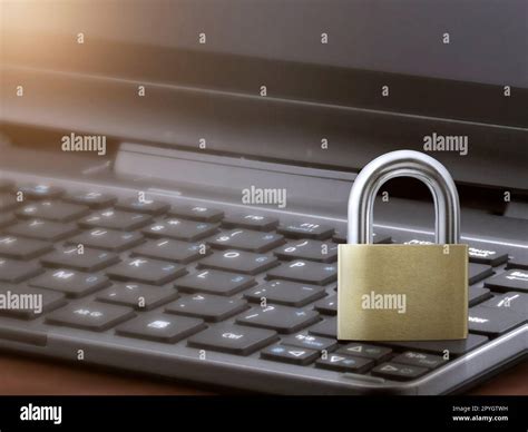 Computer Security Concept Unlocked Padlock On Laptop Keyboard Stock