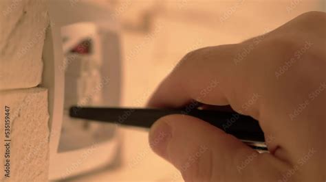 Light Switch Repair Process Checking The Network Voltage With A Tester Stock Video Adobe Stock